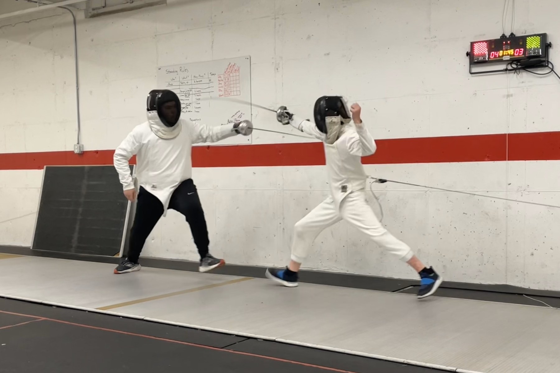 red door fencing – Olympic sport of fencing in Des Moines, Iowa