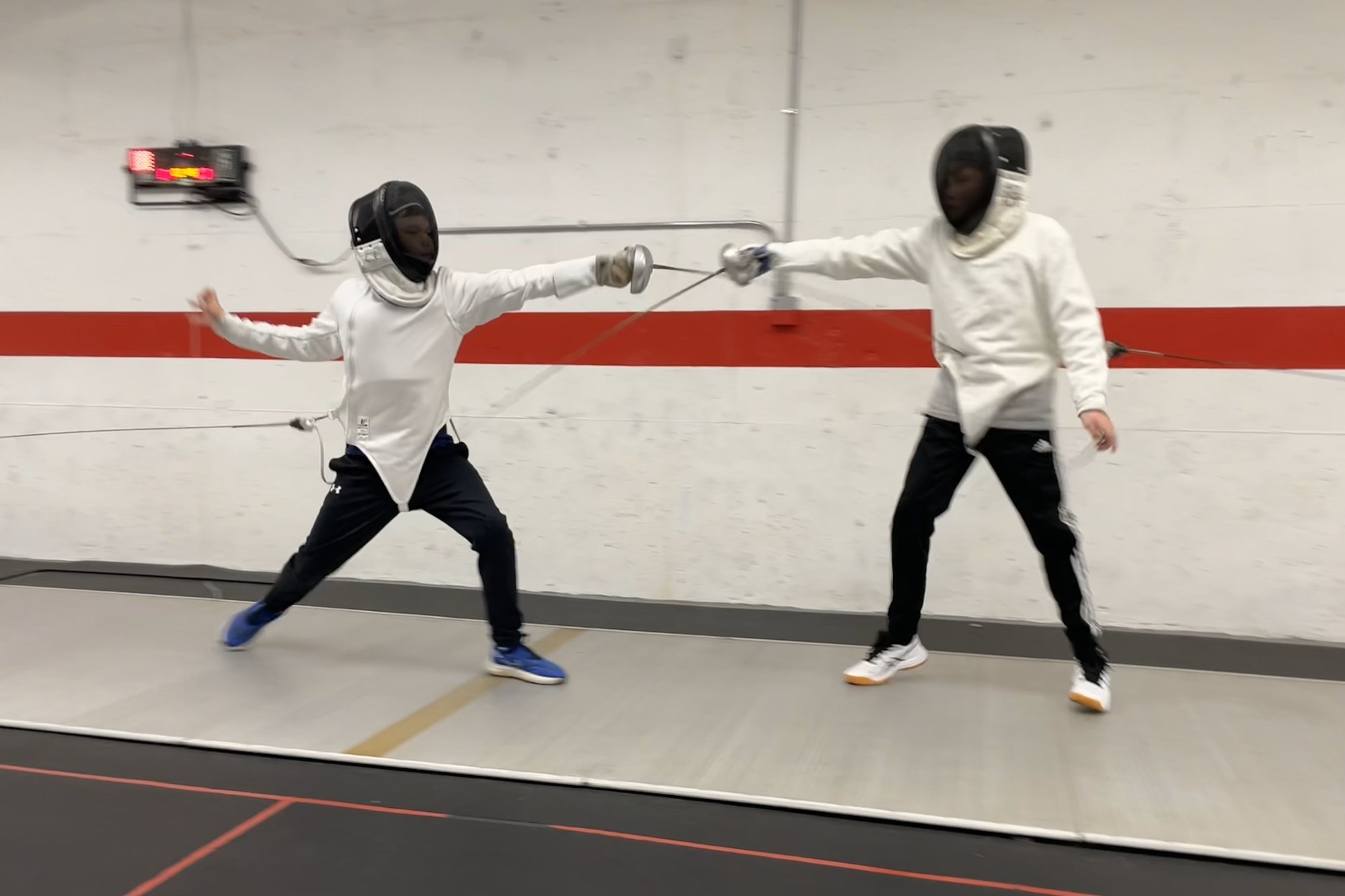 red door fencing – Olympic sport of fencing in Des Moines, Iowa