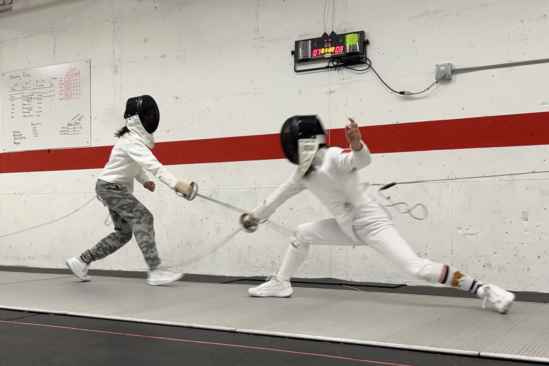 red door fencing – Olympic sport of fencing in Des Moines, Iowa