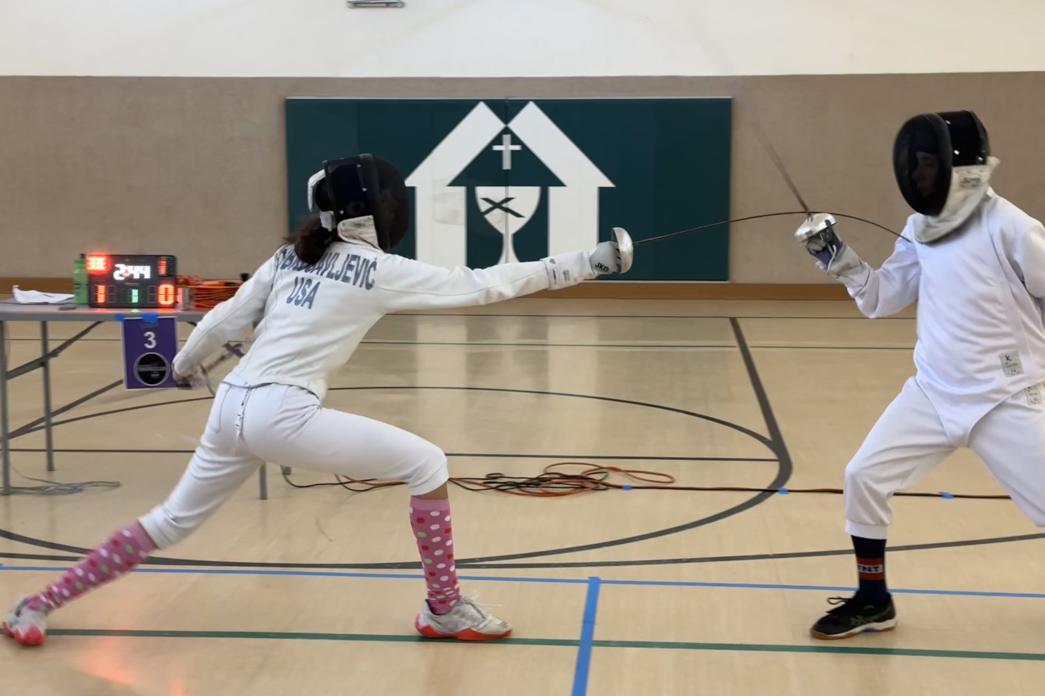 red door fencing – Olympic sport of fencing in Des Moines, Iowa