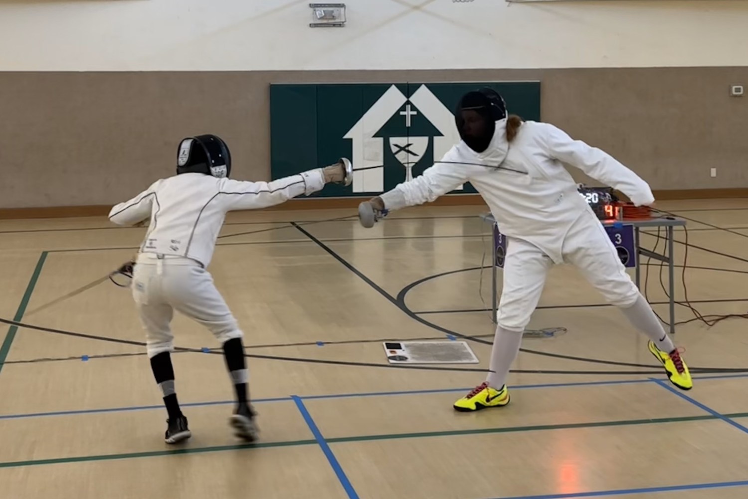red door fencing – Olympic sport of fencing in Des Moines, Iowa